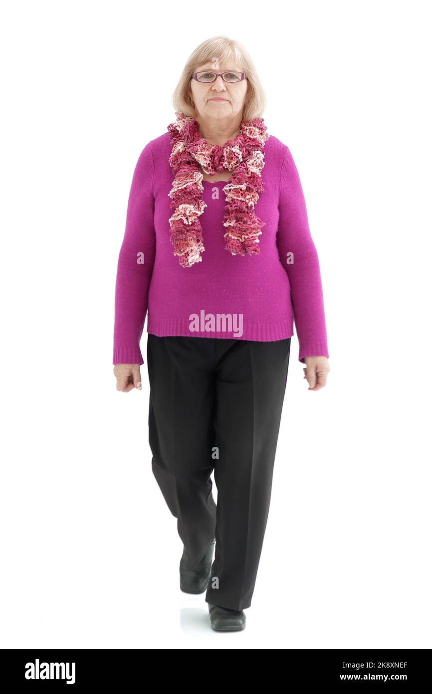 Elderly happy woman - full body walking Stock Photo - Alamy