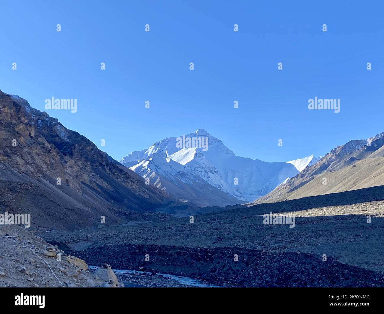 A beautiful landscape of rocky mountains and the famous Mount Everest ...