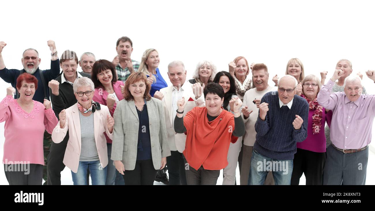 Group of senior people raising their hands celebrating a victory Stock ...