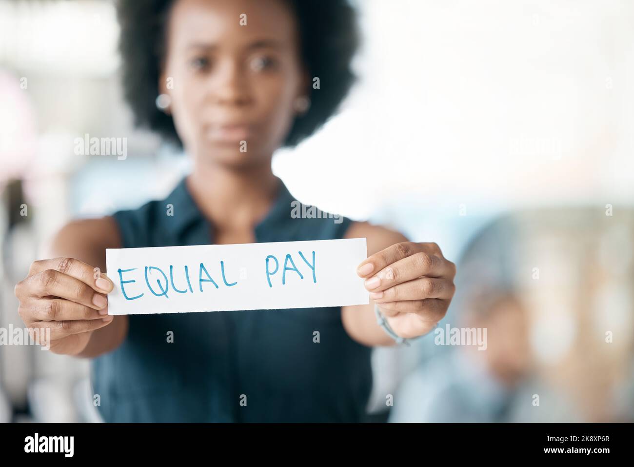 Paper sign, gender and finance equality with black woman, salary and ...