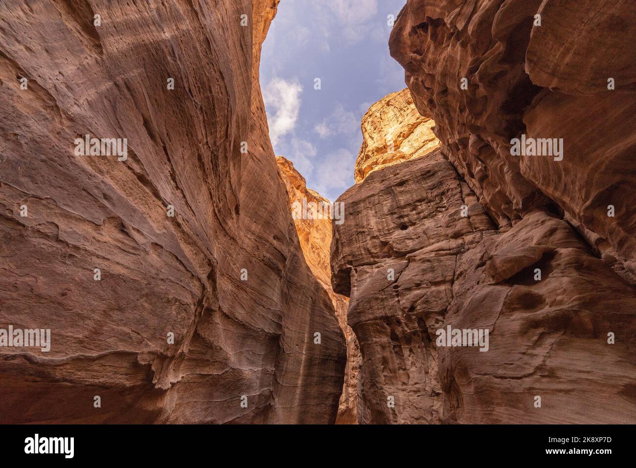A scenic view of red canyons in the desert with a piece of sky Stock ...