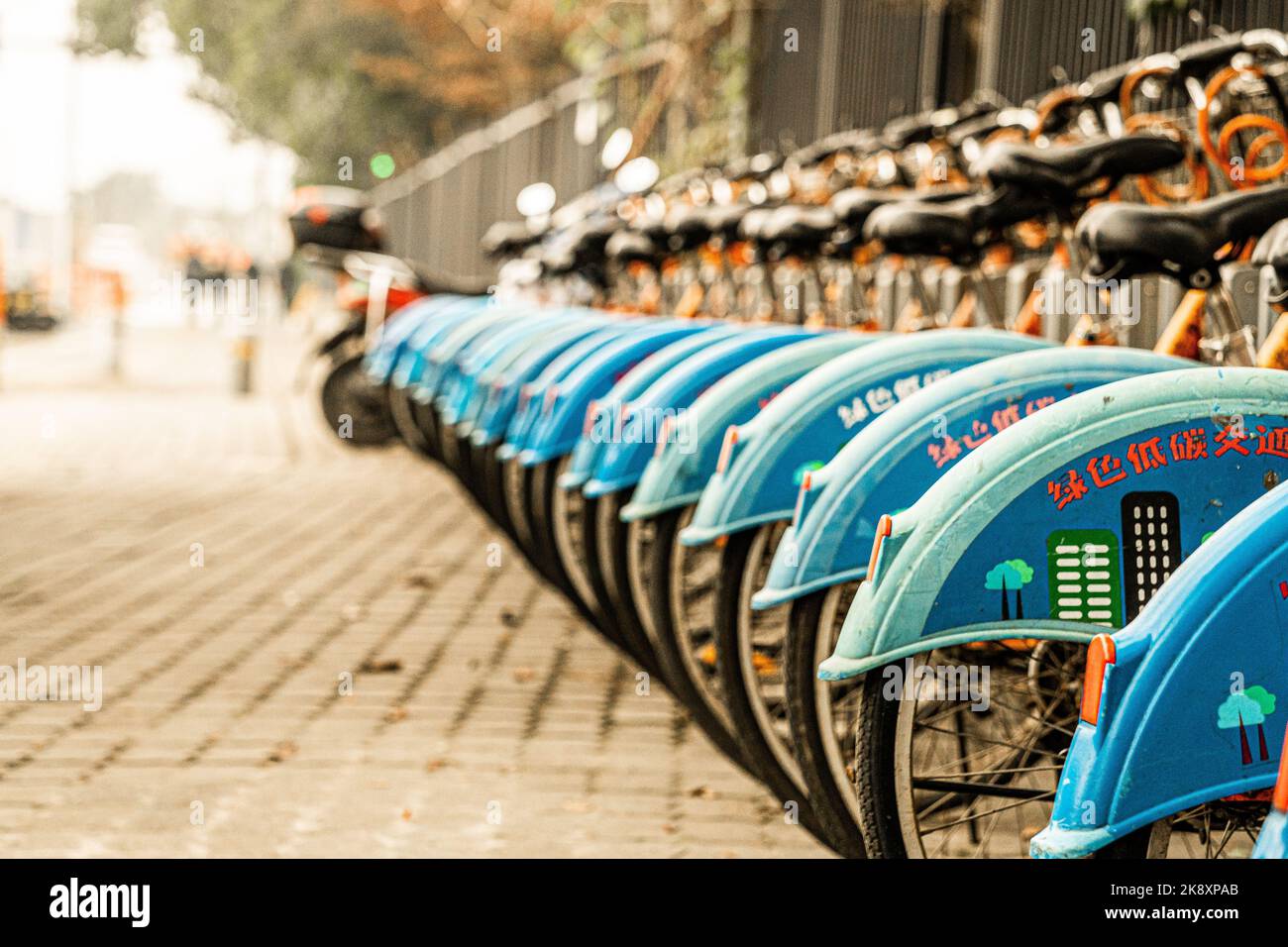 A selective focus shot of bicycles at the bike station in Yinzhou District, Ningbo Stock Photo ...