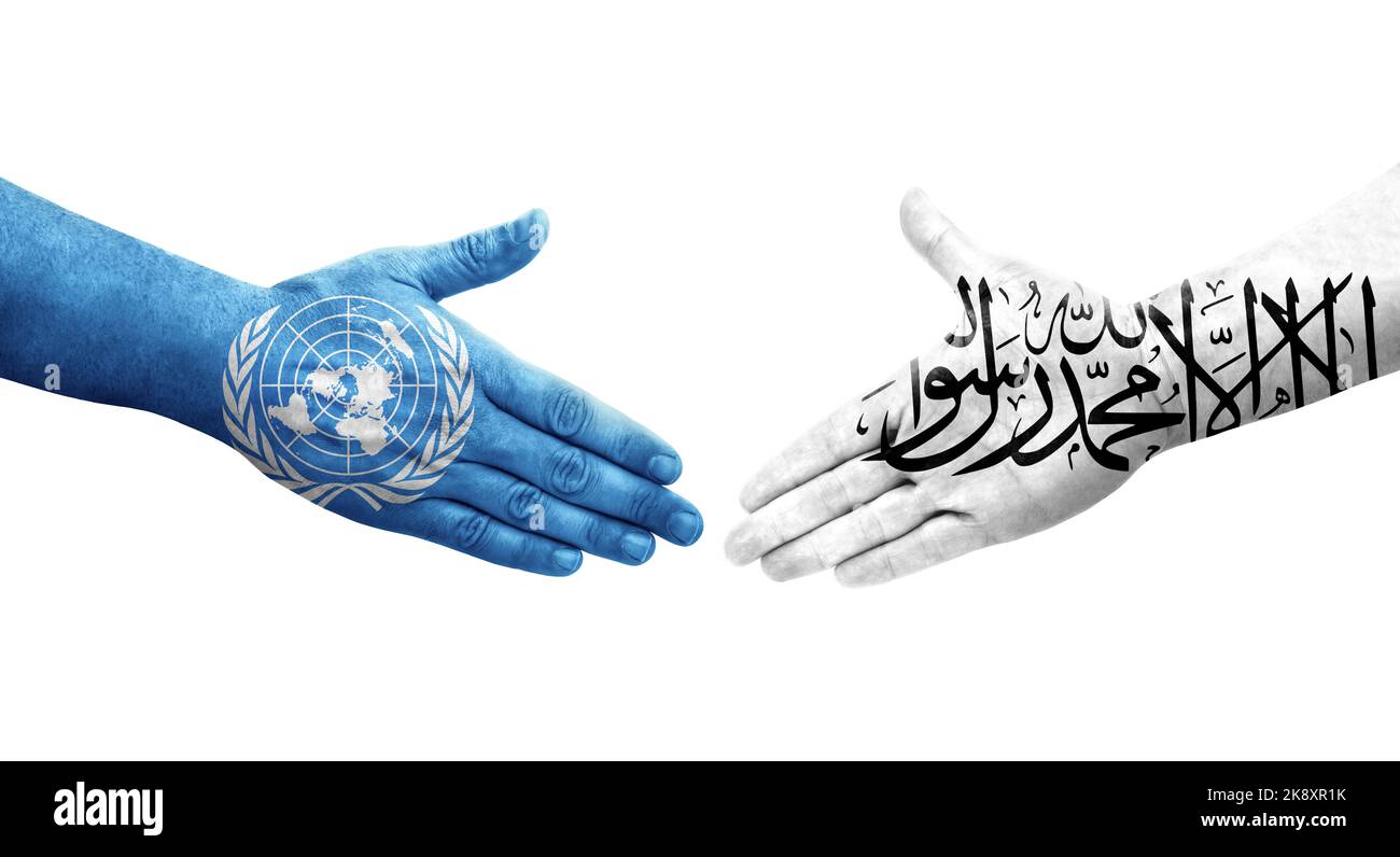 Handshake between Afghanistan and United Nations flags painted on hands ...