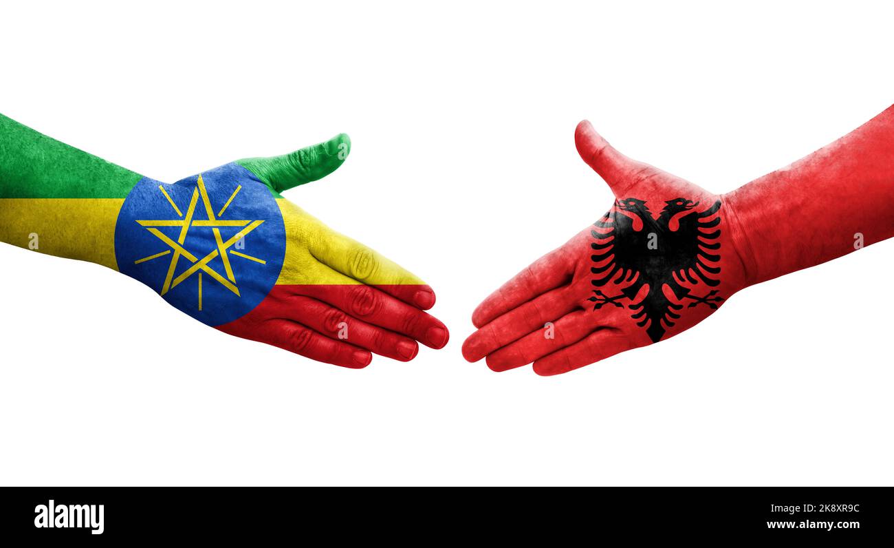 Handshake between Albania and Ethiopia flags painted on hands, isolated ...