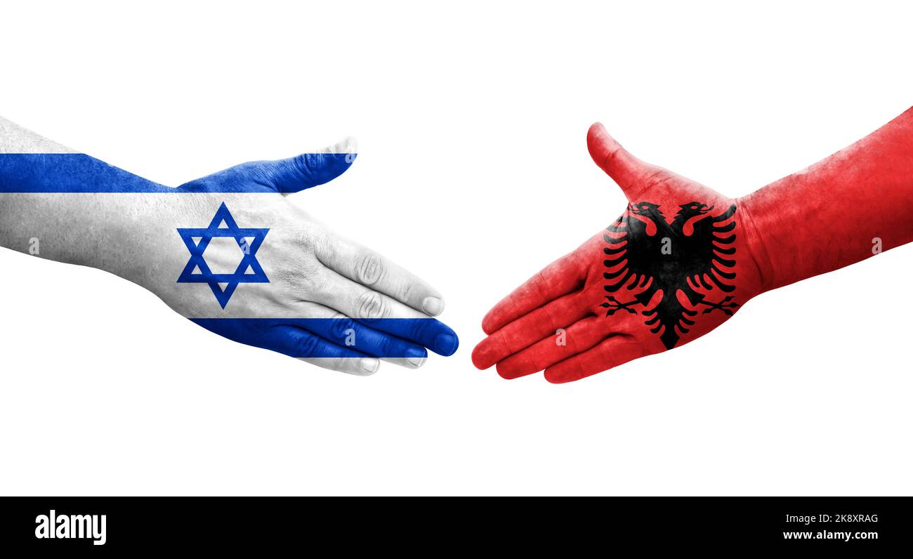 Handshake between Albania and Israel flags painted on hands, isolated ...