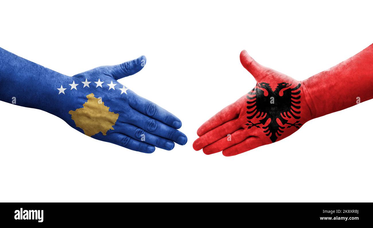 Handshake between Albania and Kosovo flags painted on hands, isolated ...