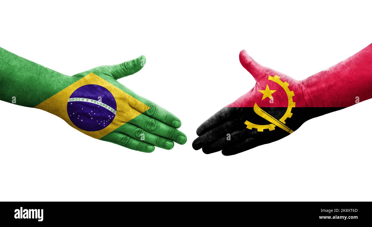 Handshake between Angola and Brazil flags painted on hands, isolated ...
