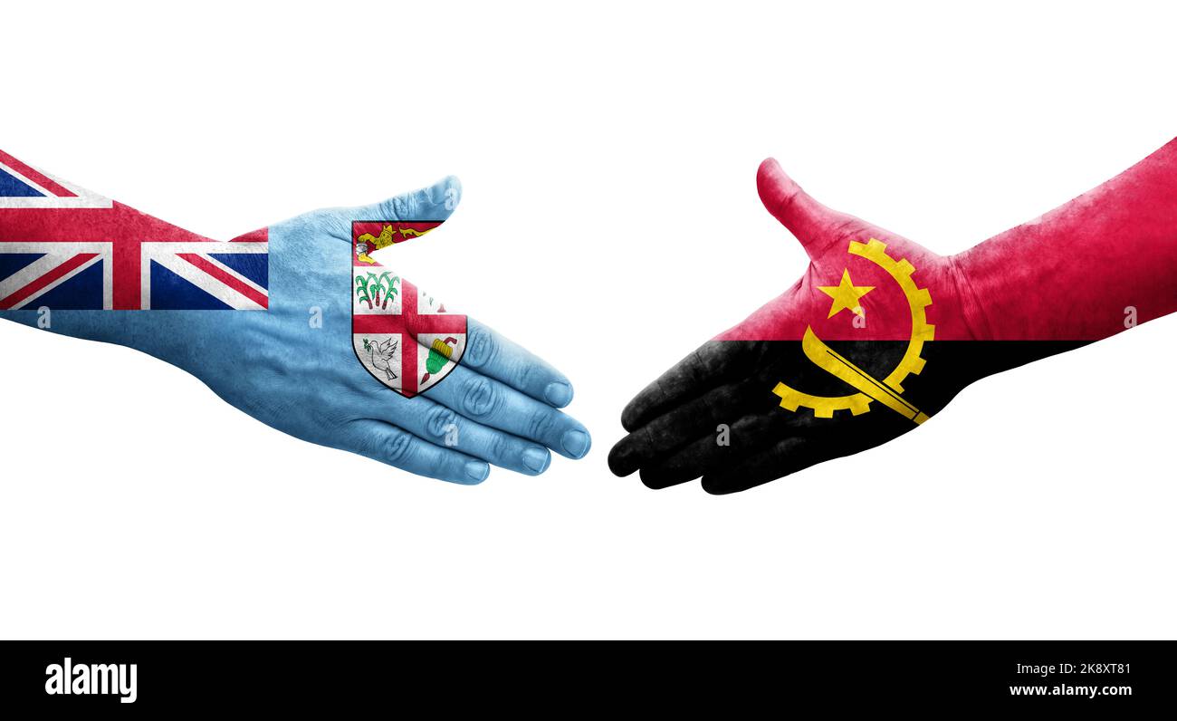 Handshake between Angola and Fiji flags painted on hands, isolated ...