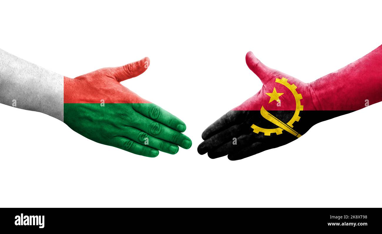 Handshake between Angola and Madagascar flags painted on hands ...