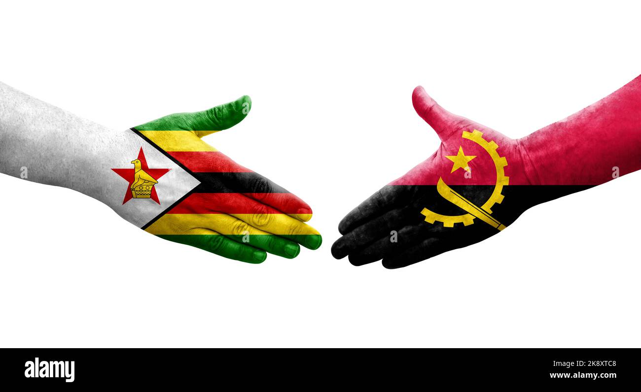 Handshake between Angola and Zimbabwe flags painted on hands, isolated ...