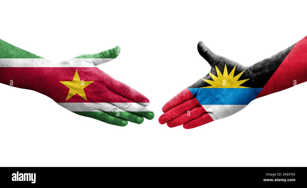 Handshake between Antigua and Barbuda and Suriname flags painted on ...