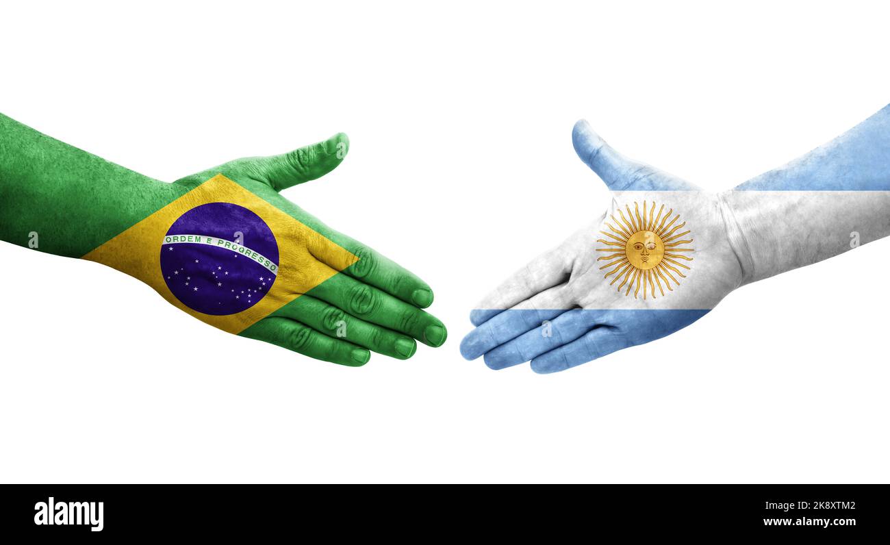Handshake between Argentina and Brazil flags painted on hands, isolated ...