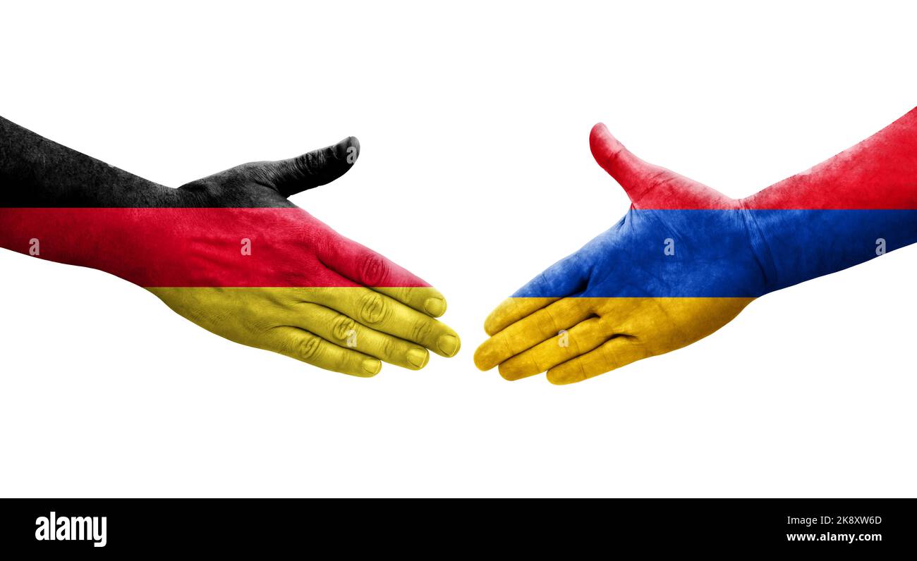 Handshake between Armenia and Germany flags painted on hands, isolated ...