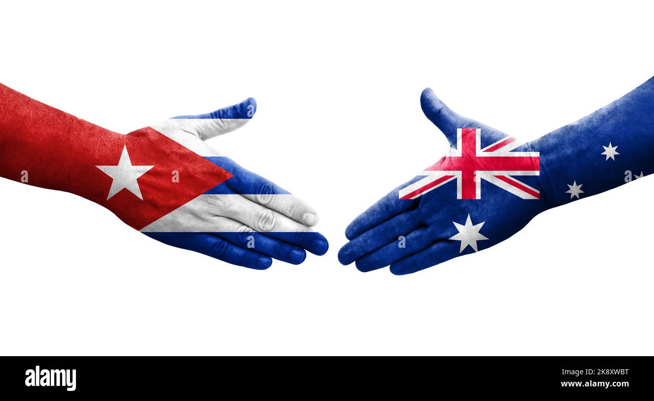 Handshake between Australia and Cuba flags painted on hands, isolated ...