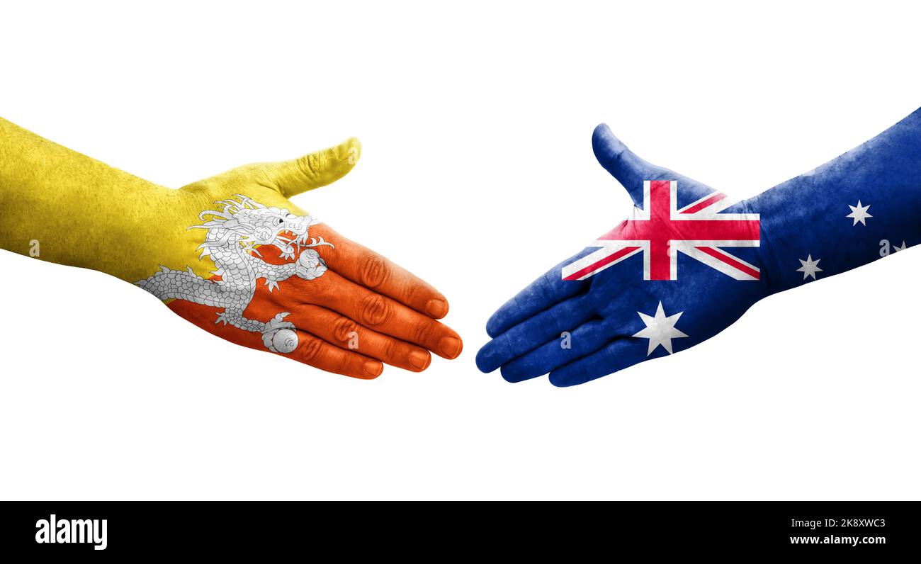 Handshake between Australia and Bhutan flags painted on hands, isolated ...