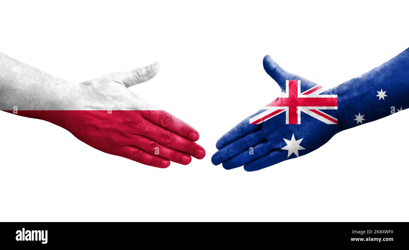 Handshake between Australia and Poland flags painted on hands, isolated ...