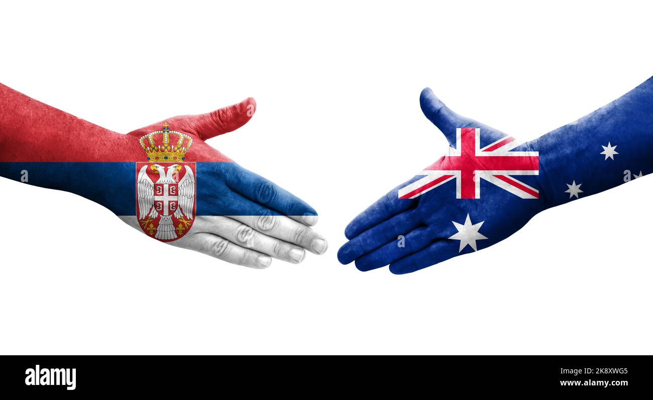 Handshake between Australia and Serbia flags painted on hands, isolated ...