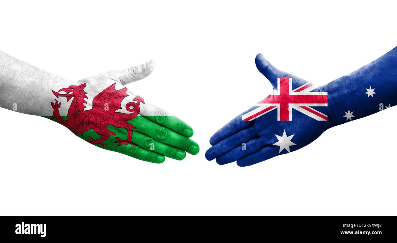 Handshake between Australia and Wales flags painted on hands, isolated ...