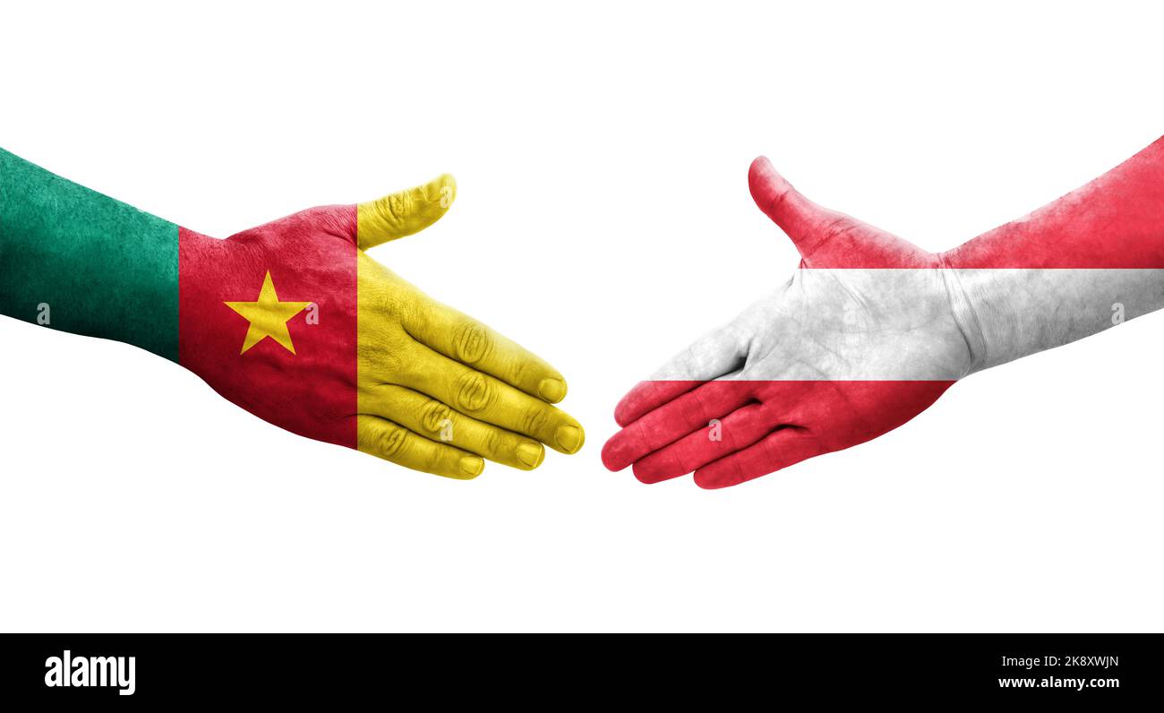 Handshake between Austria and Cameroon flags painted on hands, isolated ...