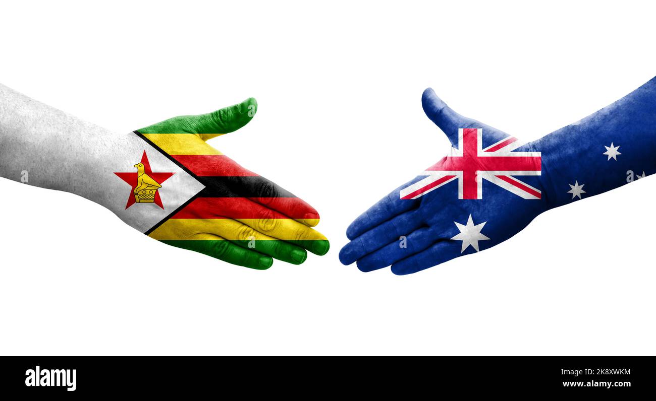 Handshake between Australia and Zimbabwe flags painted on hands ...