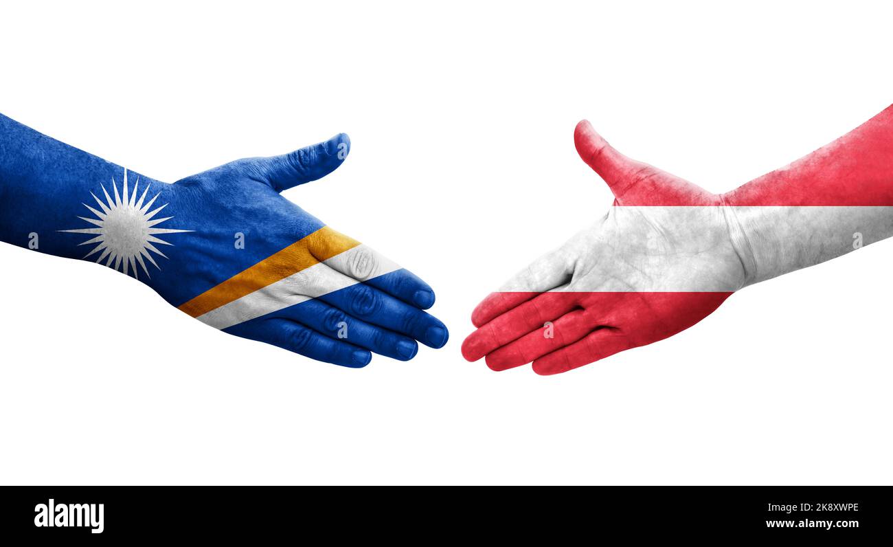 Handshake between Austria and Marshall Islands flags painted on hands ...