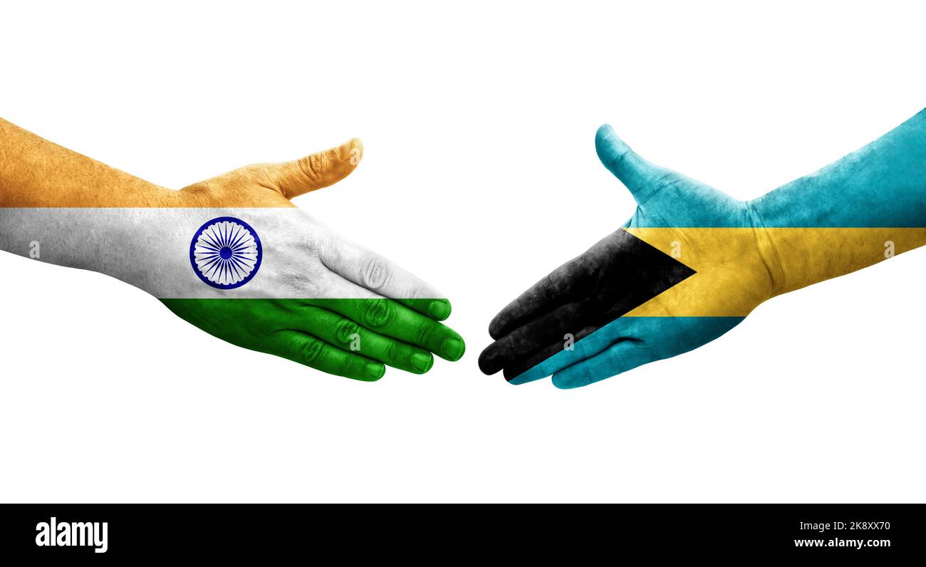 Handshake between Bahamas and India flags painted on hands, isolated ...