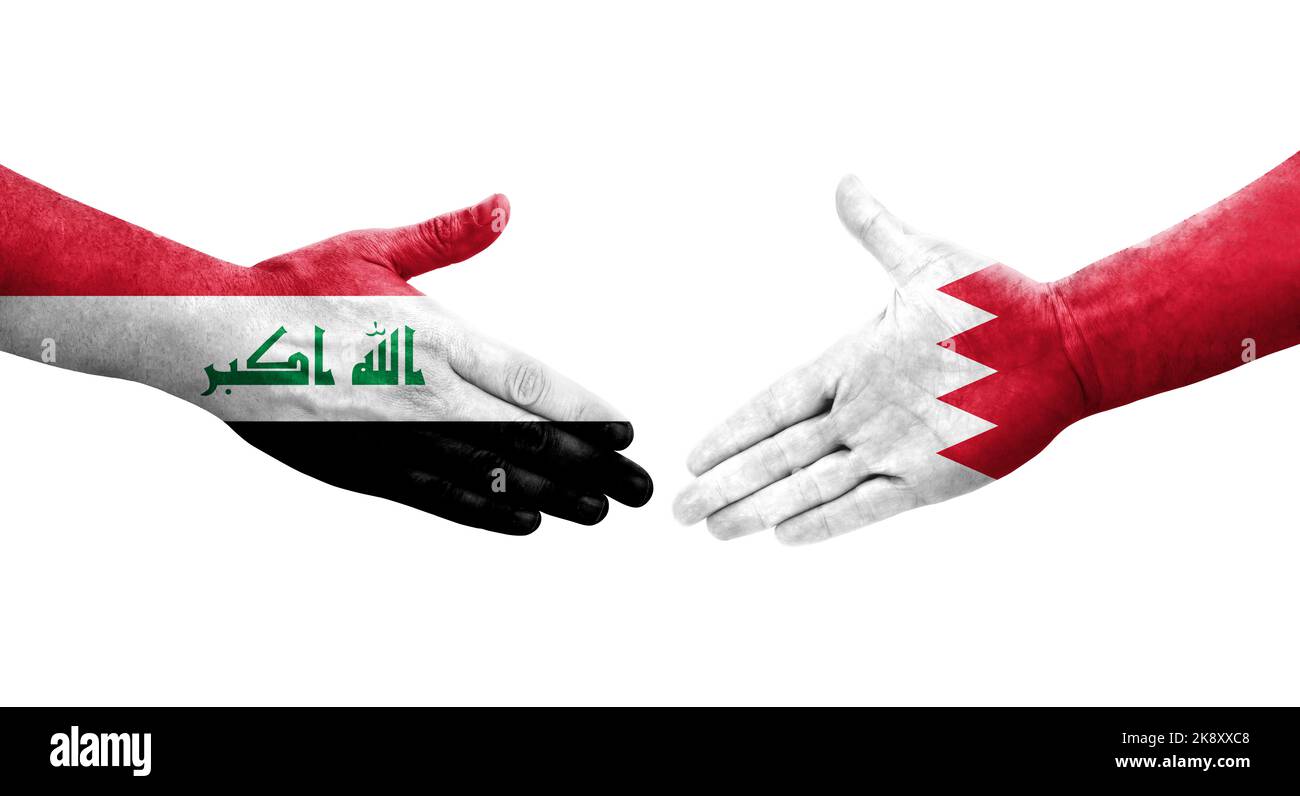 Handshake between Bahrain and Iraq flags painted on hands, isolated ...