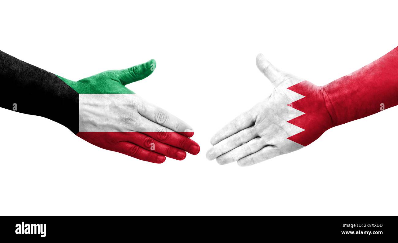 Handshake between Bahrain and Kuwait flags painted on hands, isolated ...