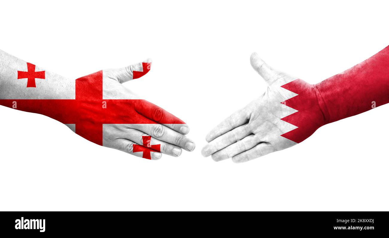 Handshake between Bahrain and Georgia flags painted on hands, isolated ...