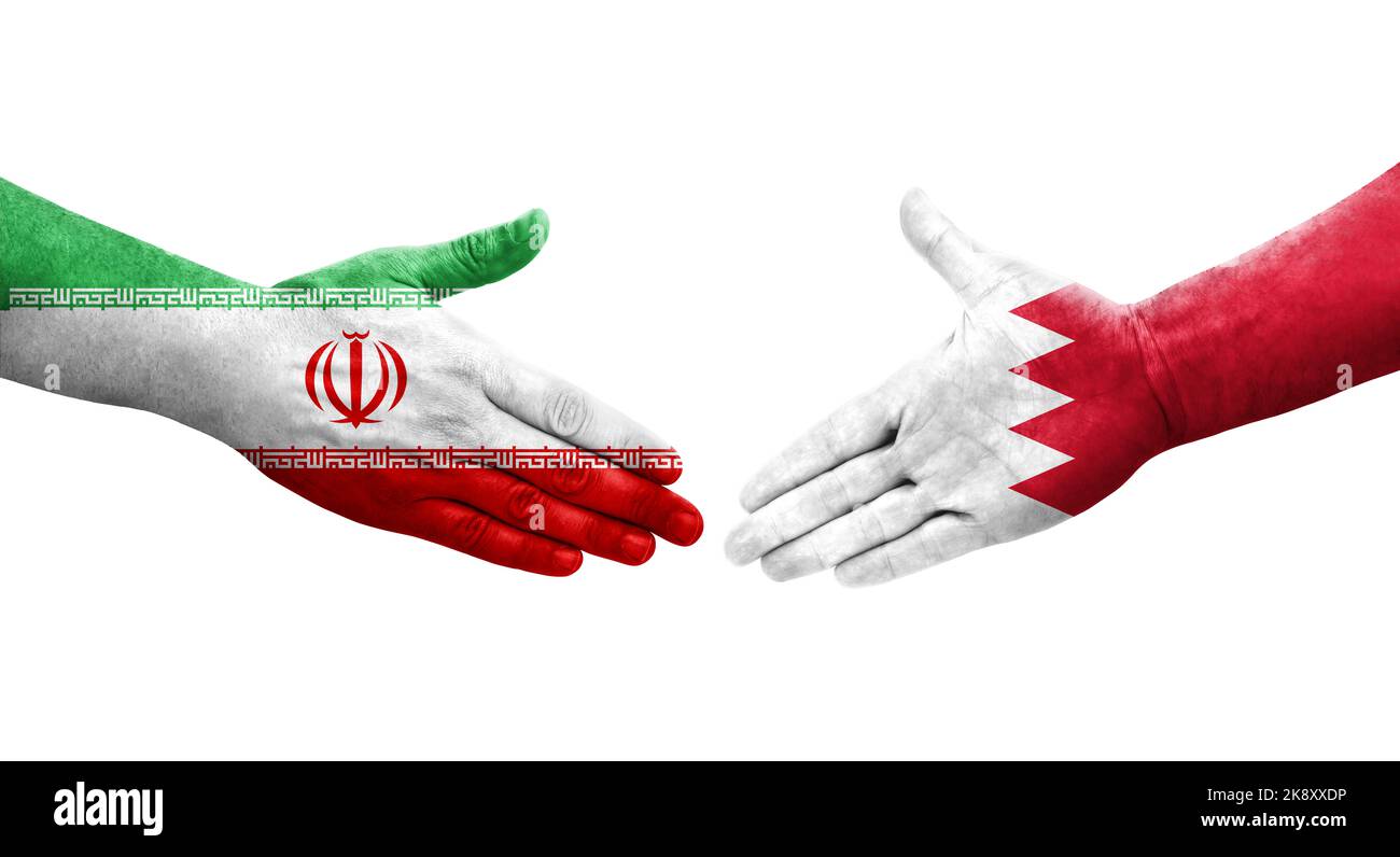 Handshake between Bahrain and Iran flags painted on hands, isolated ...