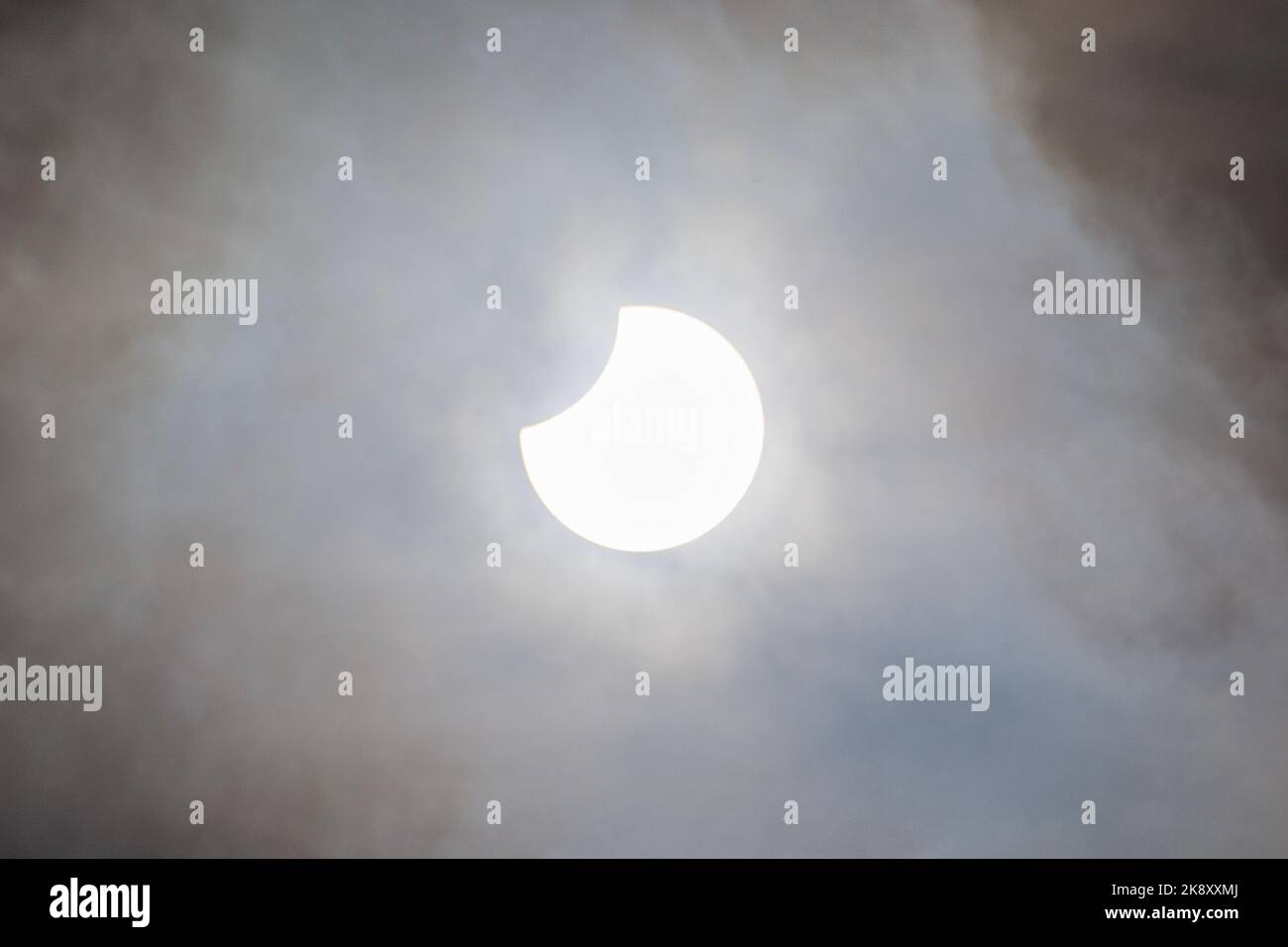 Partial Solar Eclipse with light cloud cover on October 25 2022 in ...