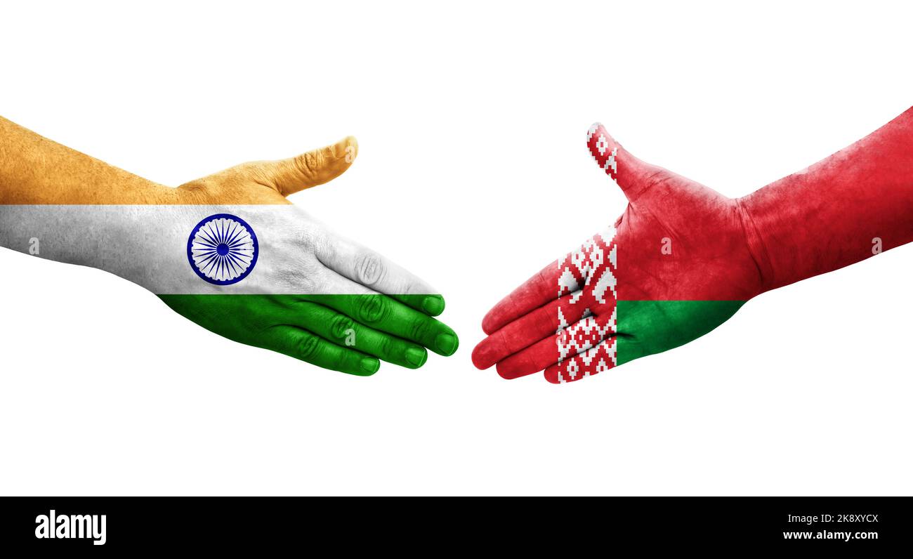 Handshake between Belarus and India flags painted on hands, isolated ...
