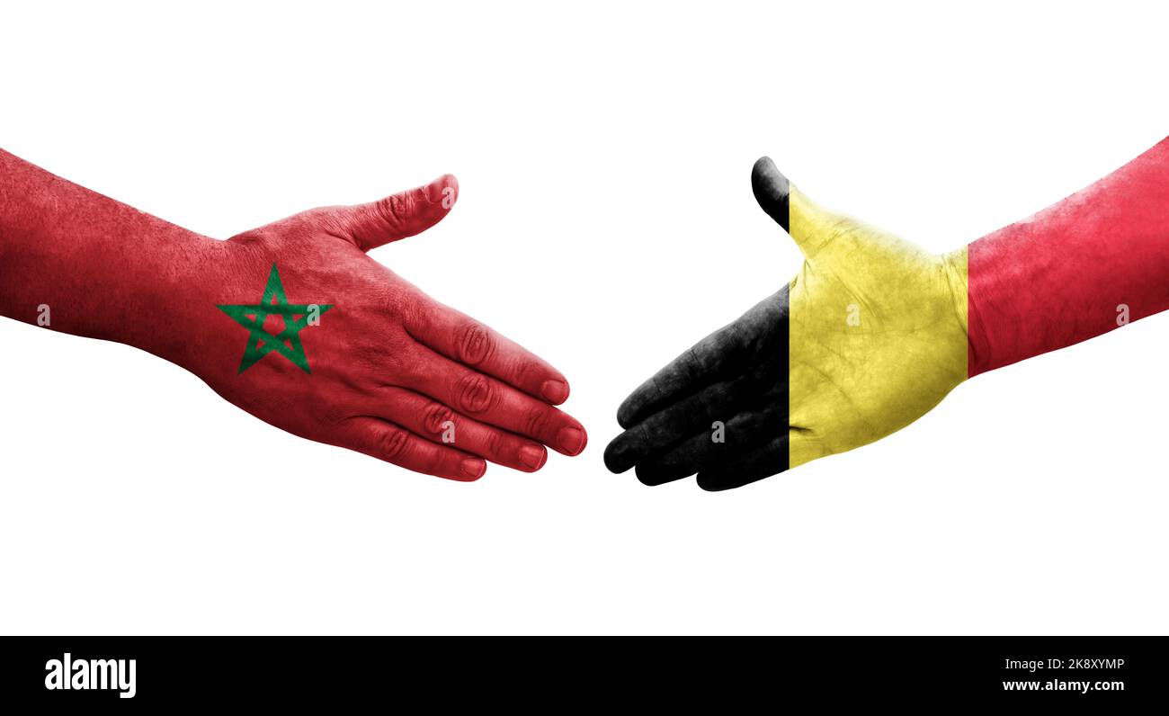 Handshake between Belgium and Morocco flags painted on hands, isolated ...