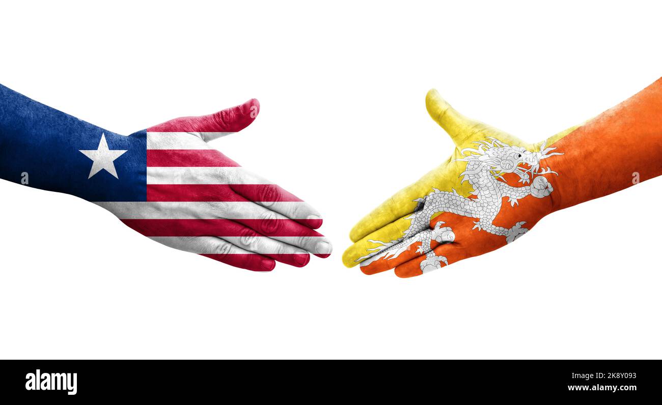 Handshake between Bhutan and Liberia flags painted on hands, isolated ...