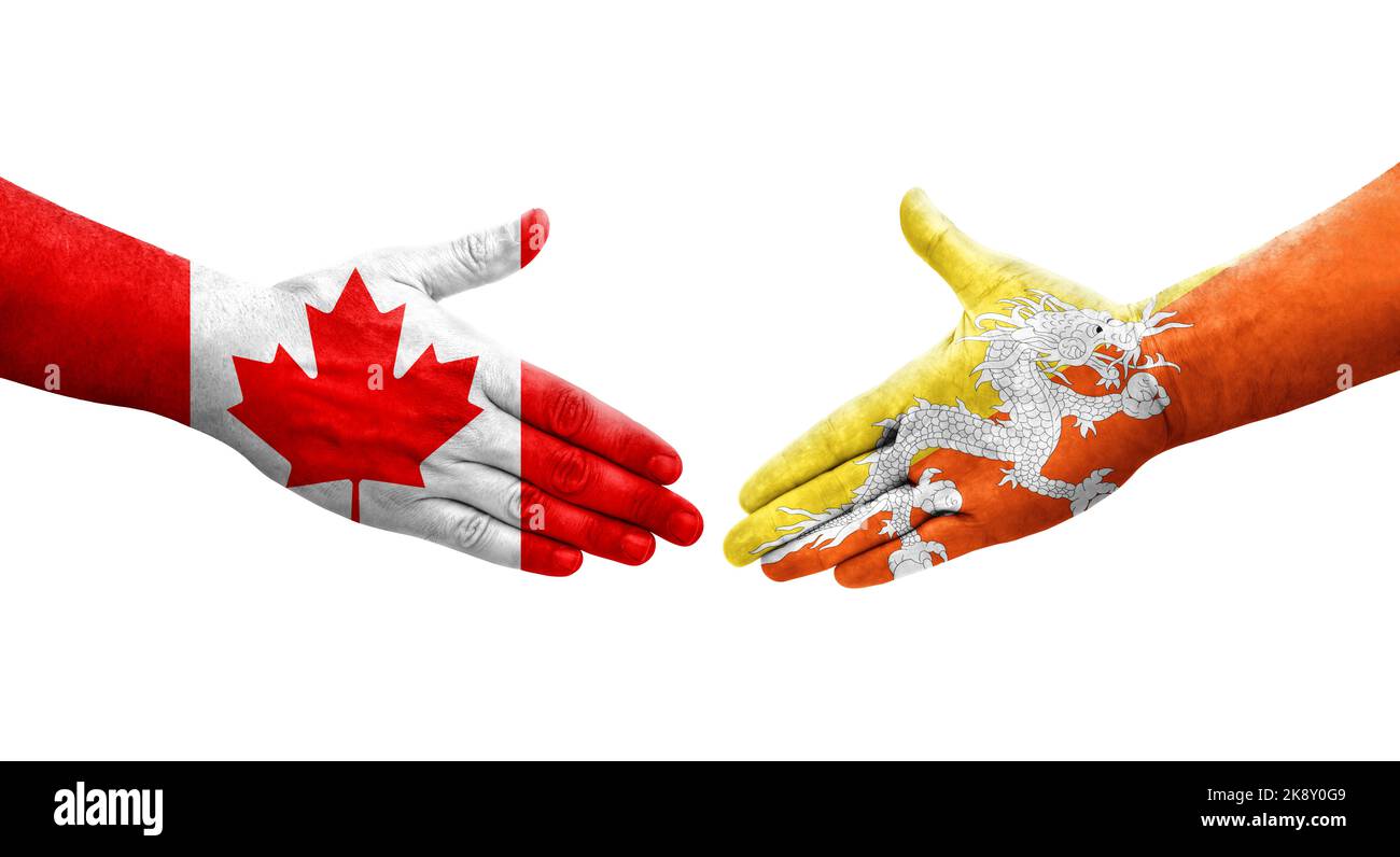 Handshake between Bhutan and Canada flags painted on hands, isolated ...