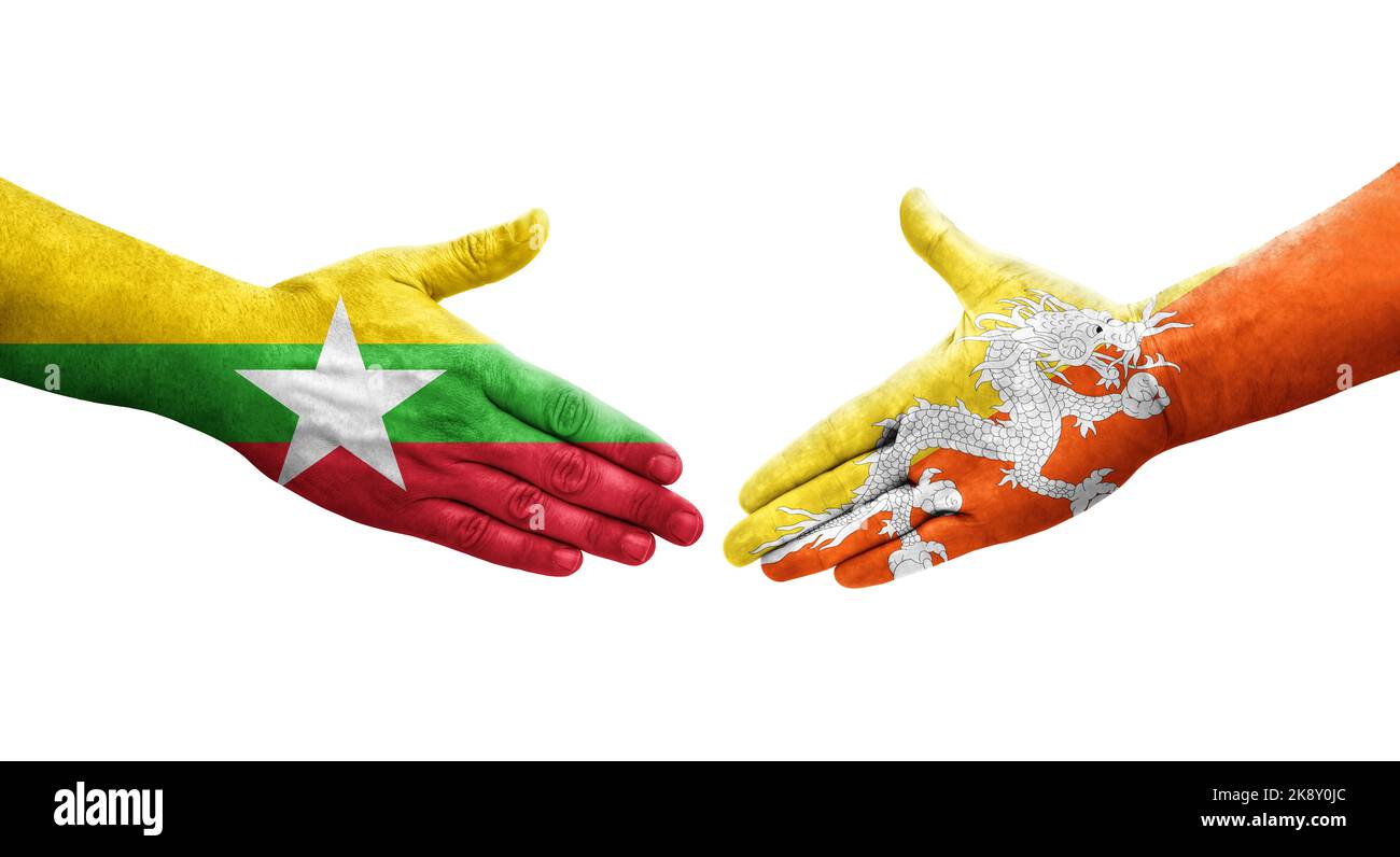 Handshake between Bhutan and Myanmar flags painted on hands, isolated ...