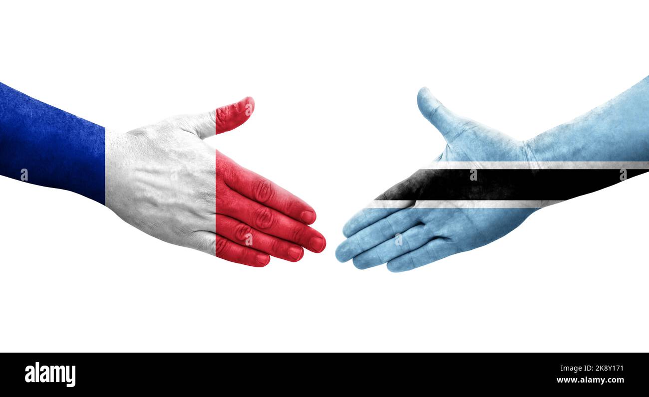 Handshake between Botswana and France flags painted on hands, isolated ...