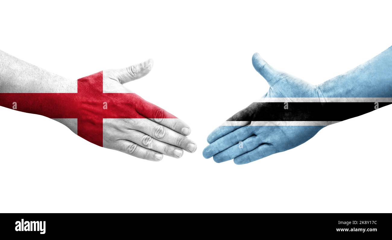 Handshake between Botswana and England flags painted on hands, isolated ...