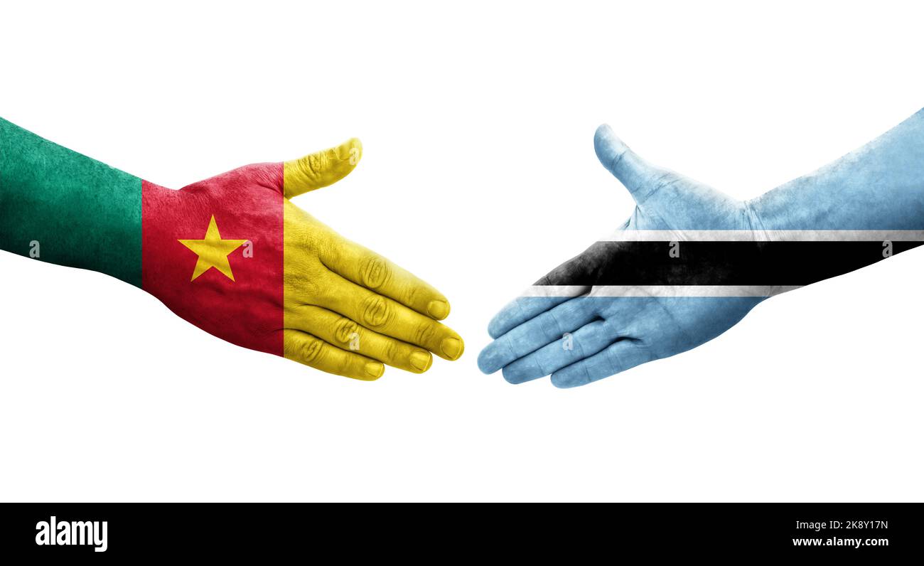 Handshake between Botswana and Cameroon flags painted on hands ...