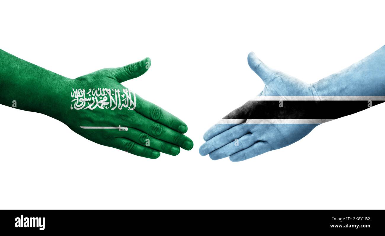 Handshake between Botswana and Saudi Arabia flags painted on hands ...