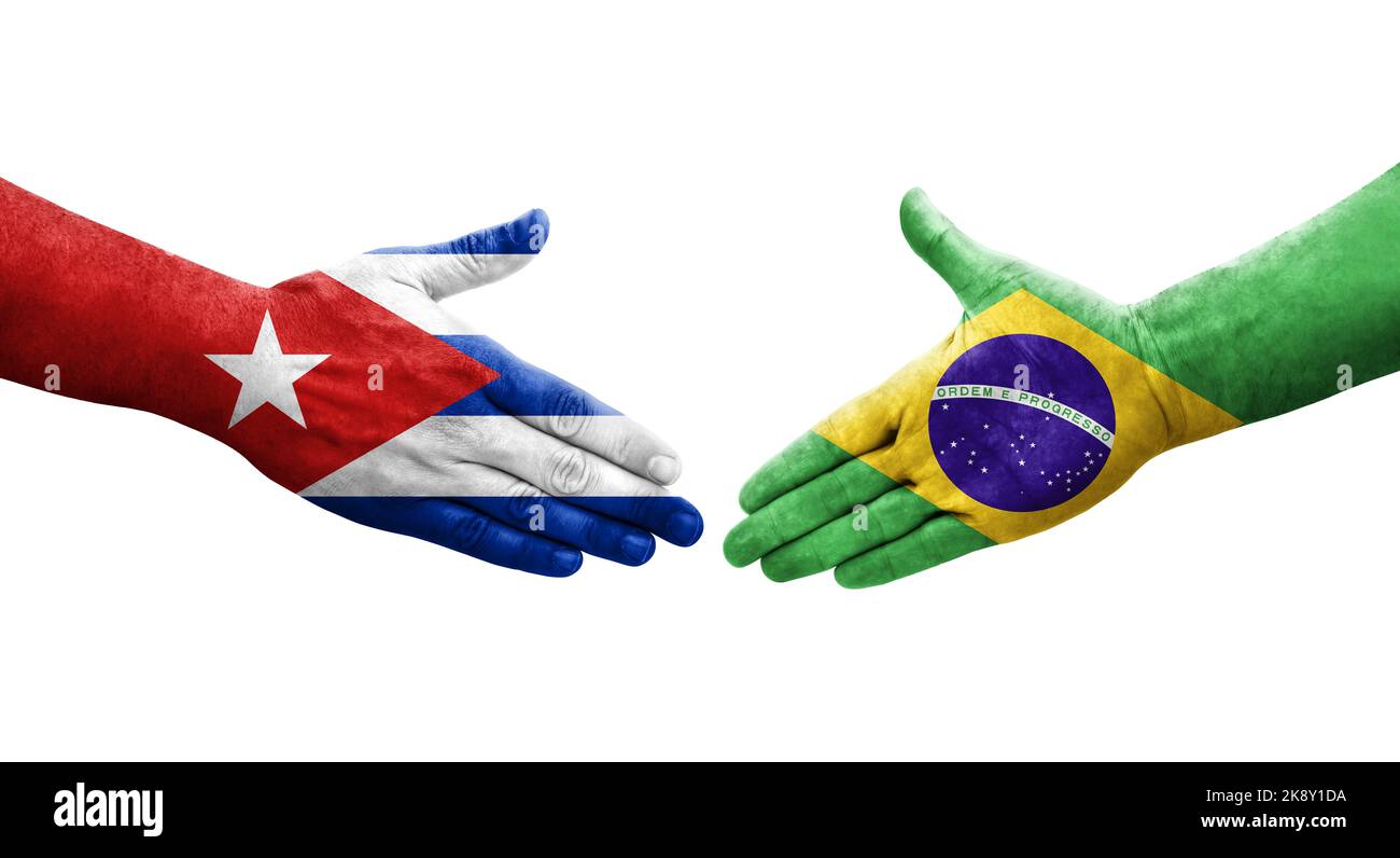 Handshake between Brazil and Cuba flags painted on hands, isolated ...