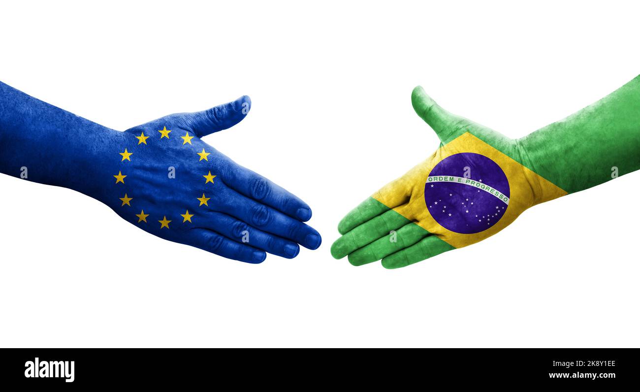 Handshake between Brazil and European Union flags painted on hands ...