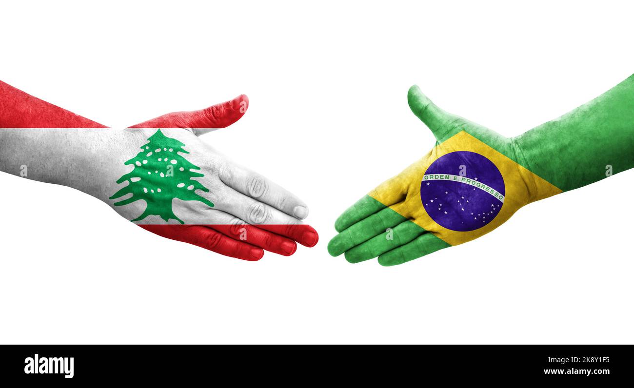 Handshake between Brazil and Lebanon flags painted on hands, isolated ...