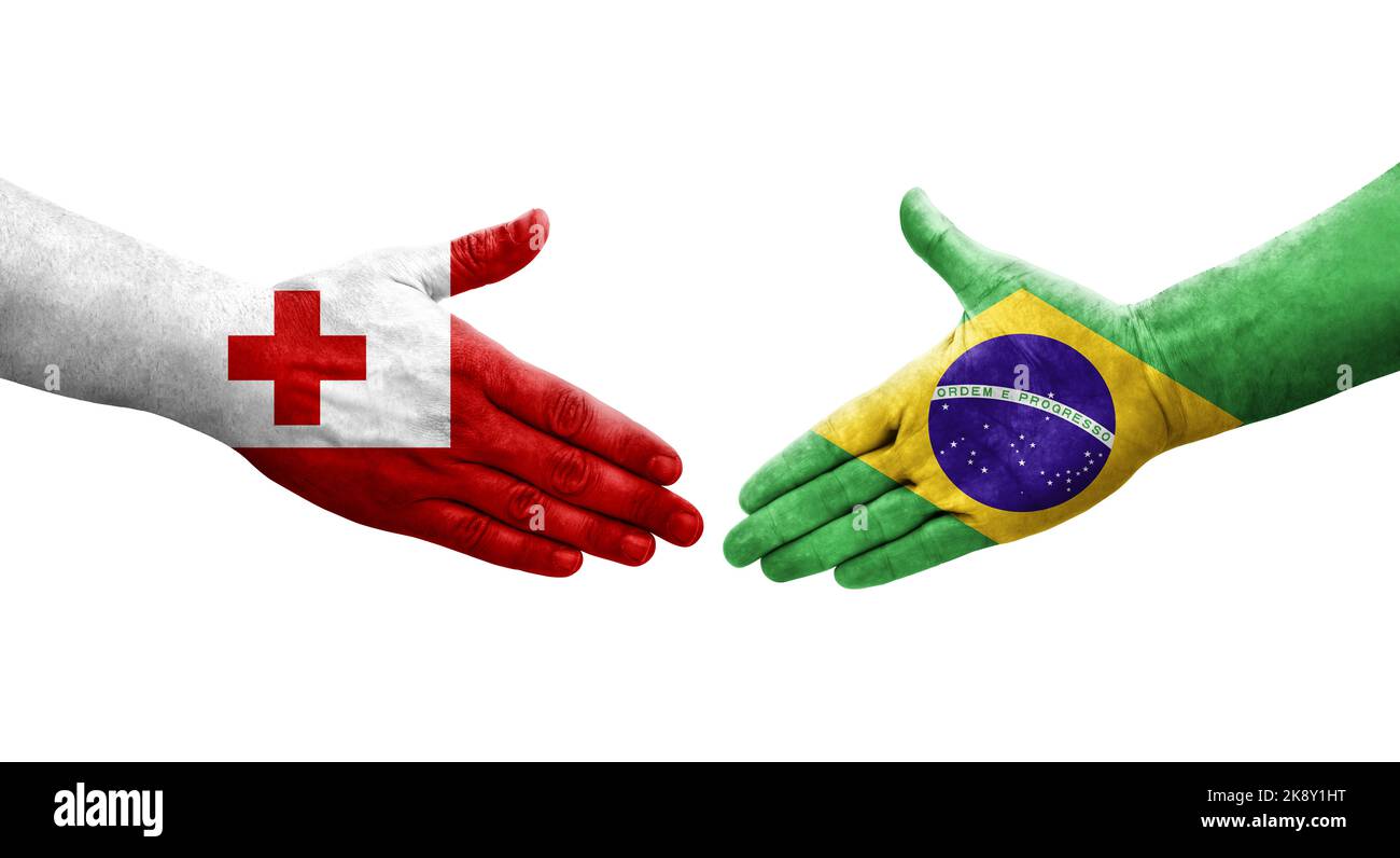 Handshake between Brazil and Tonga flags painted on hands, isolated ...