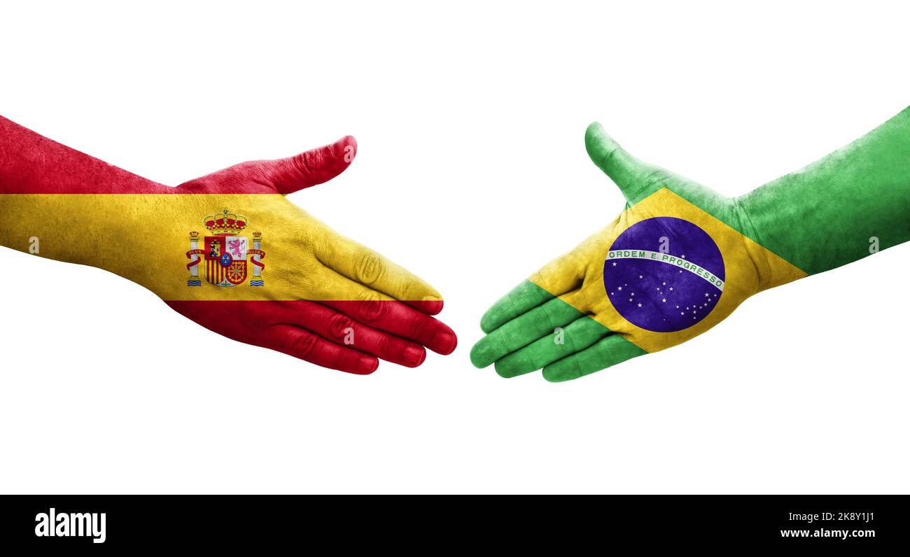 Handshake between Brazil and Spain flags painted on hands, isolated ...
