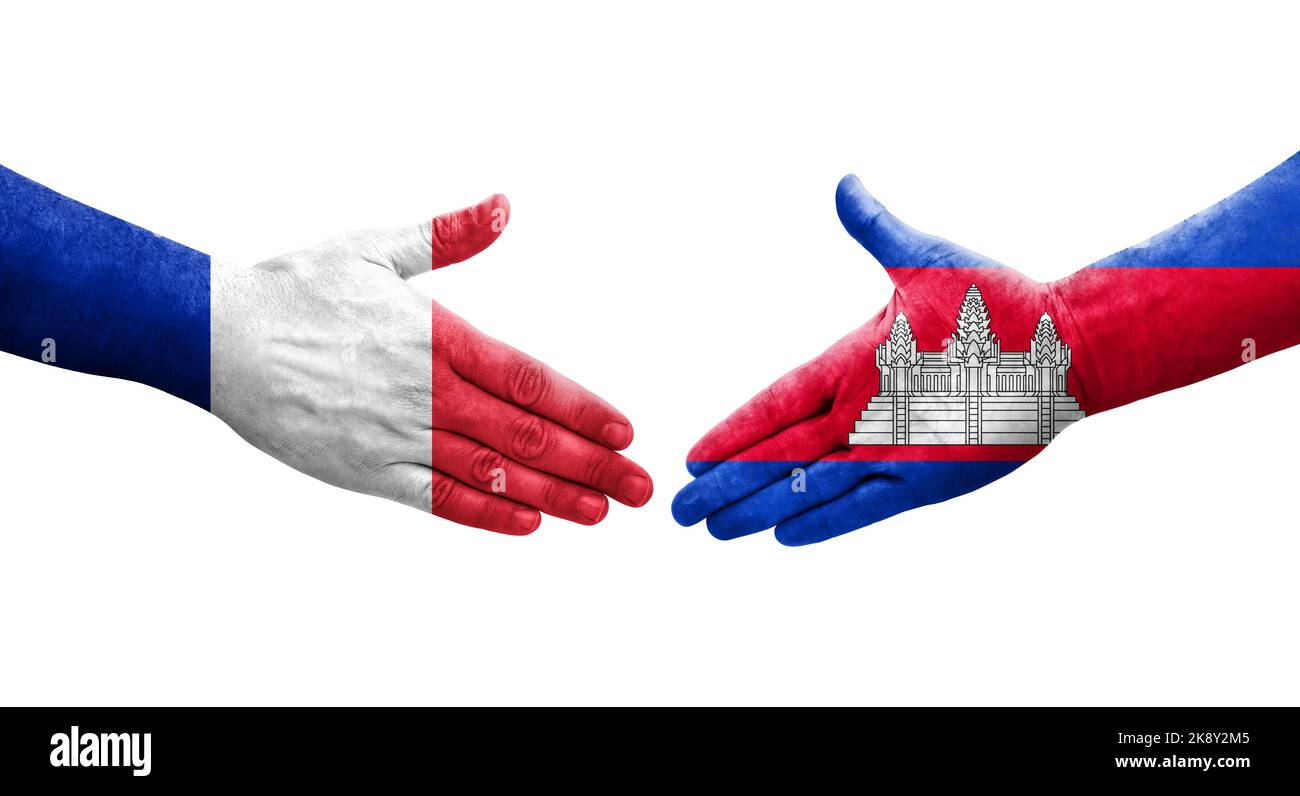 Handshake between Cambodia and France flags painted on hands, isolated ...