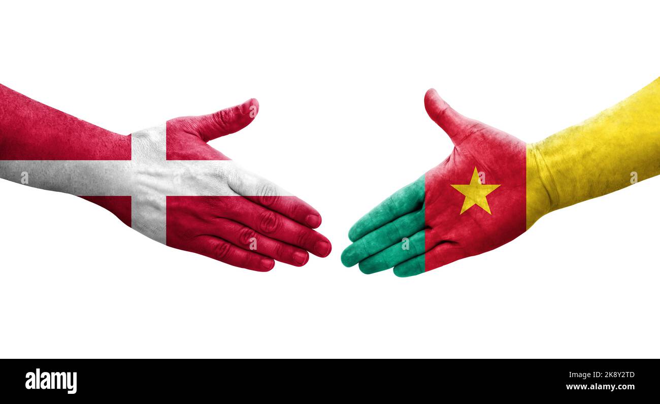 Handshake between Cameroon and Denmark flags painted on hands, isolated ...