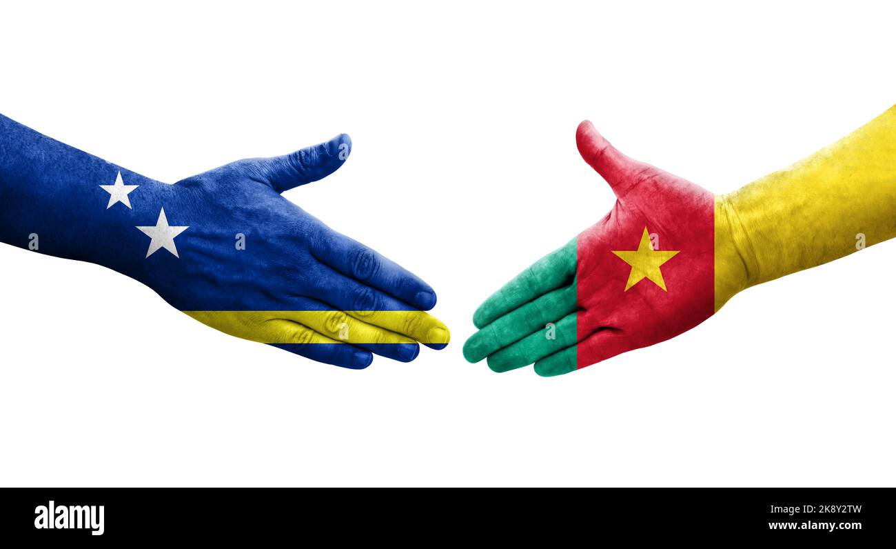 Handshake between Cameroon and Curacao flags painted on hands, isolated ...