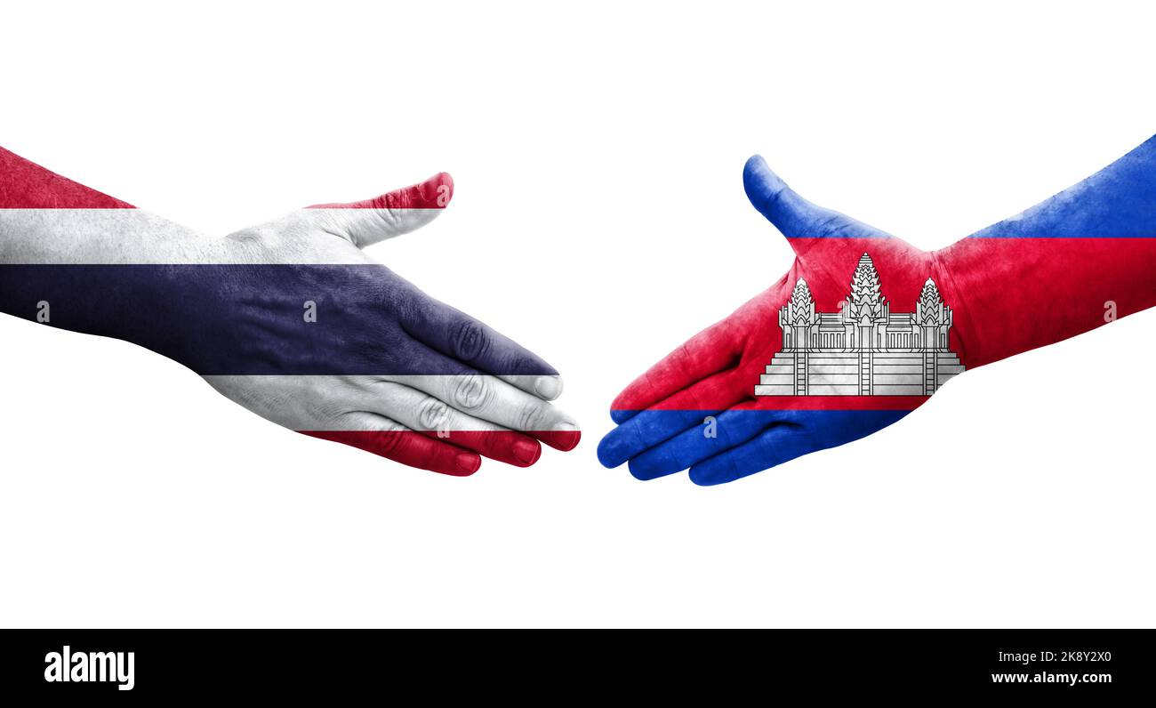 Handshake between Cambodia and Thailand flags painted on hands ...