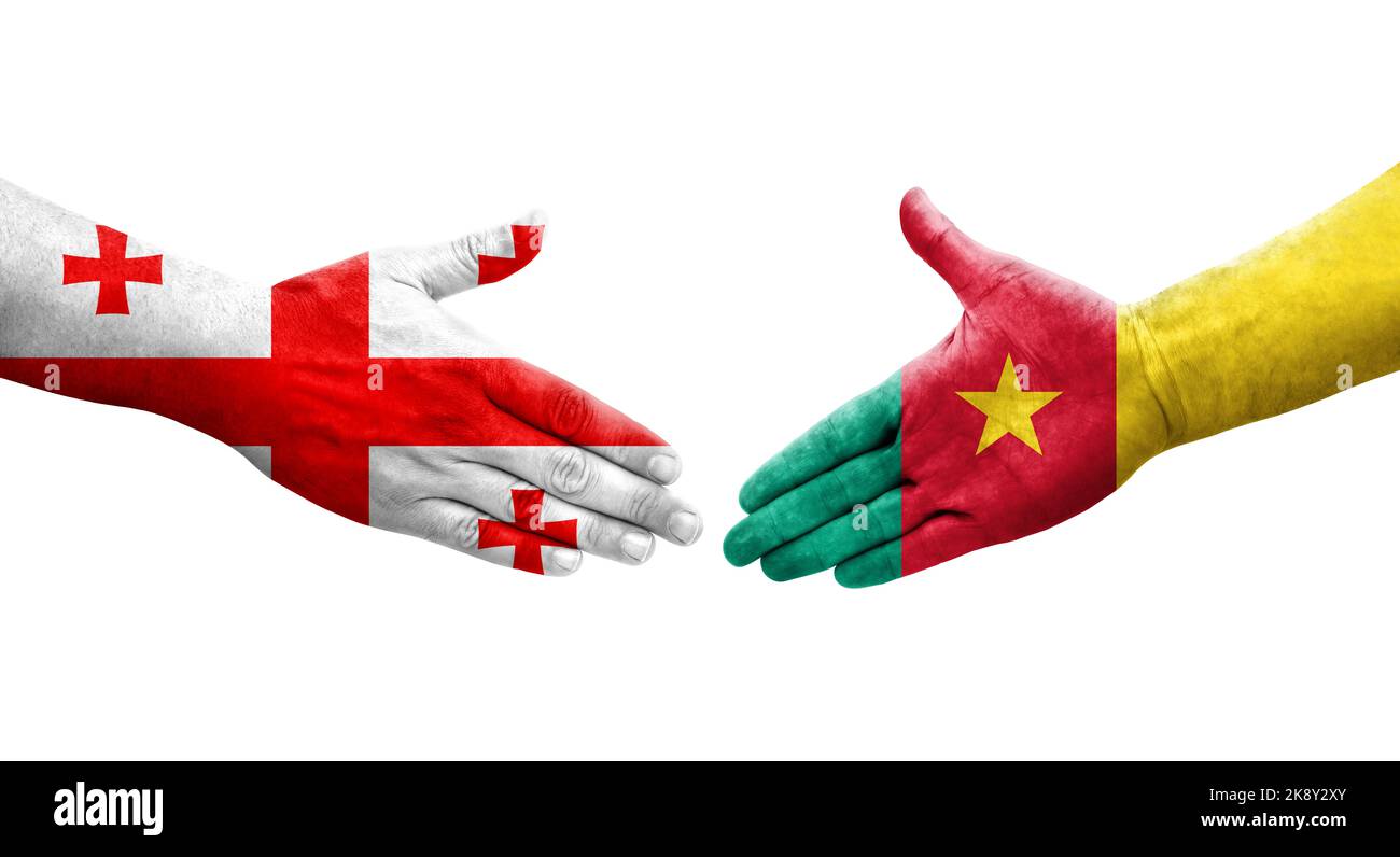 Handshake between Cameroon and Georgia flags painted on hands, isolated ...